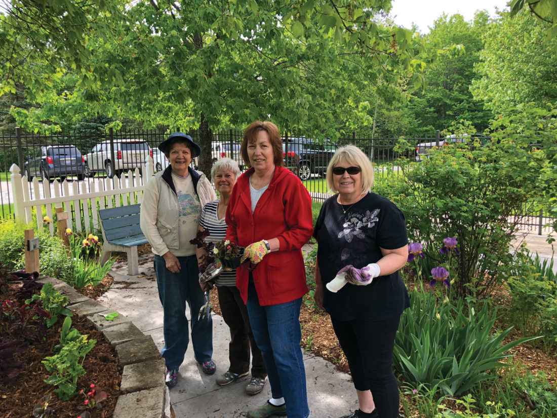 Volunteers spruce up Serenity Garden | News, Sports, Jobs - Daily Press